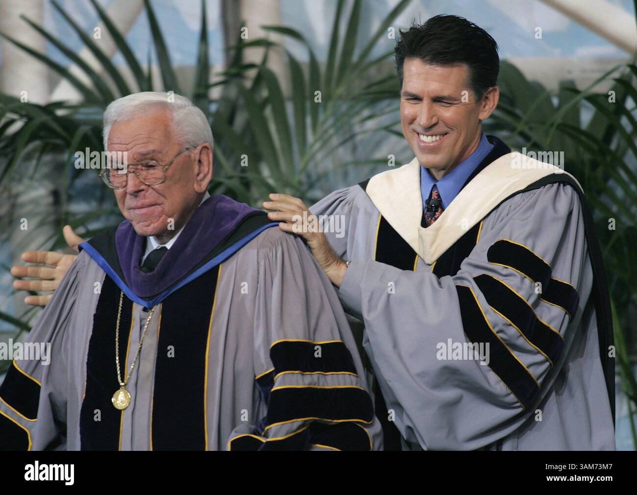 Dec. 30, 2005 - U.S. - Robert A. Schuller, right, comforts his ...