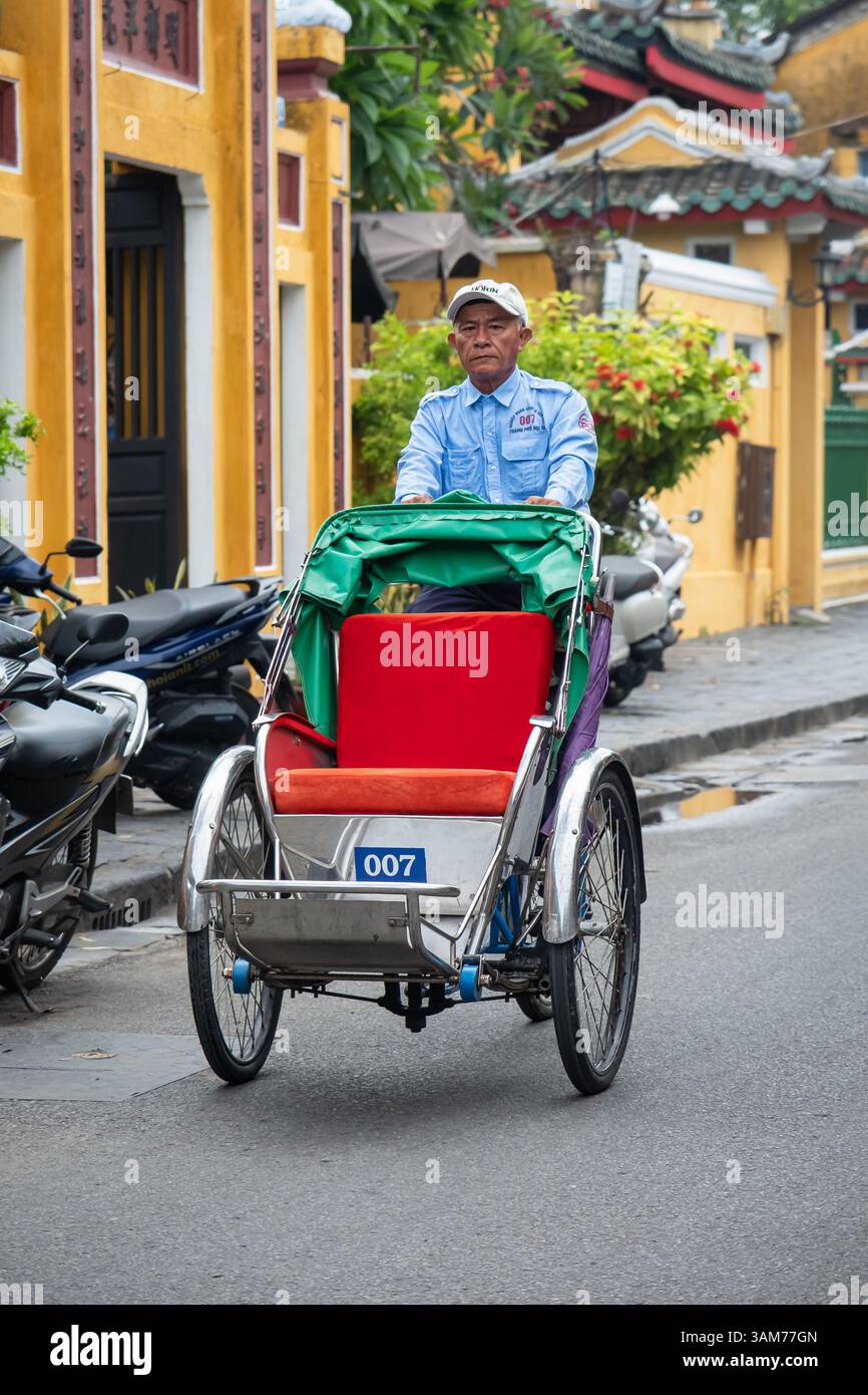 Tricycle on the street of old town. Cyclo traditional rickshaw for ...