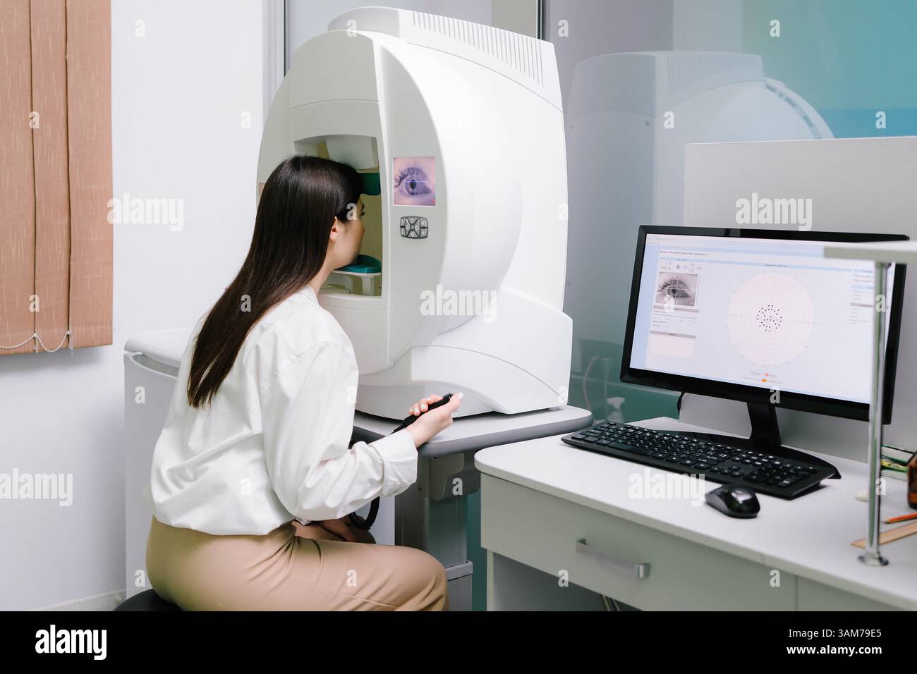 Perimetry eyes test for early sign of glaucoma of woman patient of ...