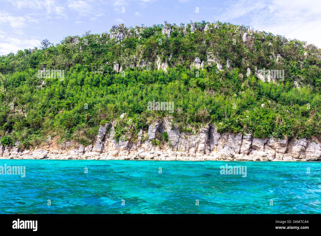 View of dramatic limestone karst mountains in Isla Gigantes, Iloilo ...