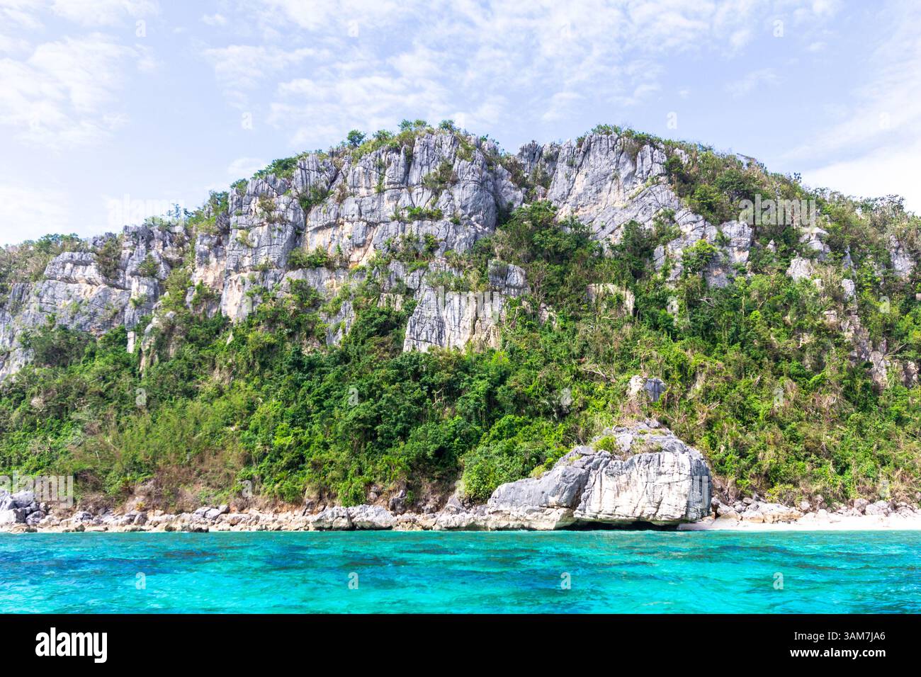 View of dramatic limestone karst mountains in Isla Gigantes, Iloilo ...