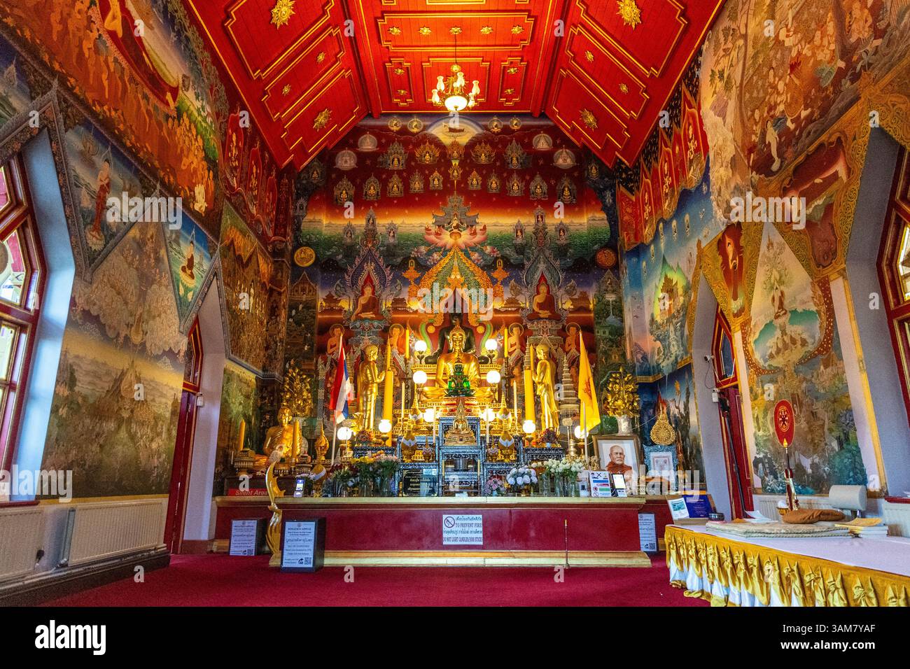 Buddha statue inside the Ordination Hall of Buddhapadipa Temple with ...