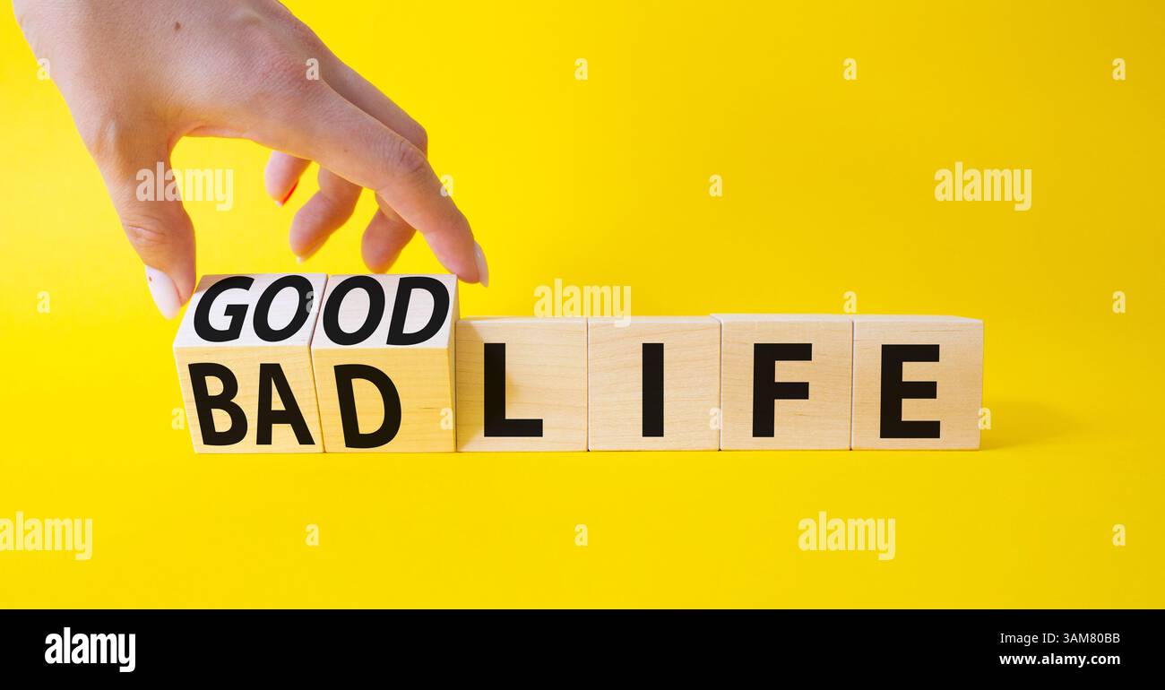 Good life and Bad life symbol. Businessman hand. Turned cubes with ...