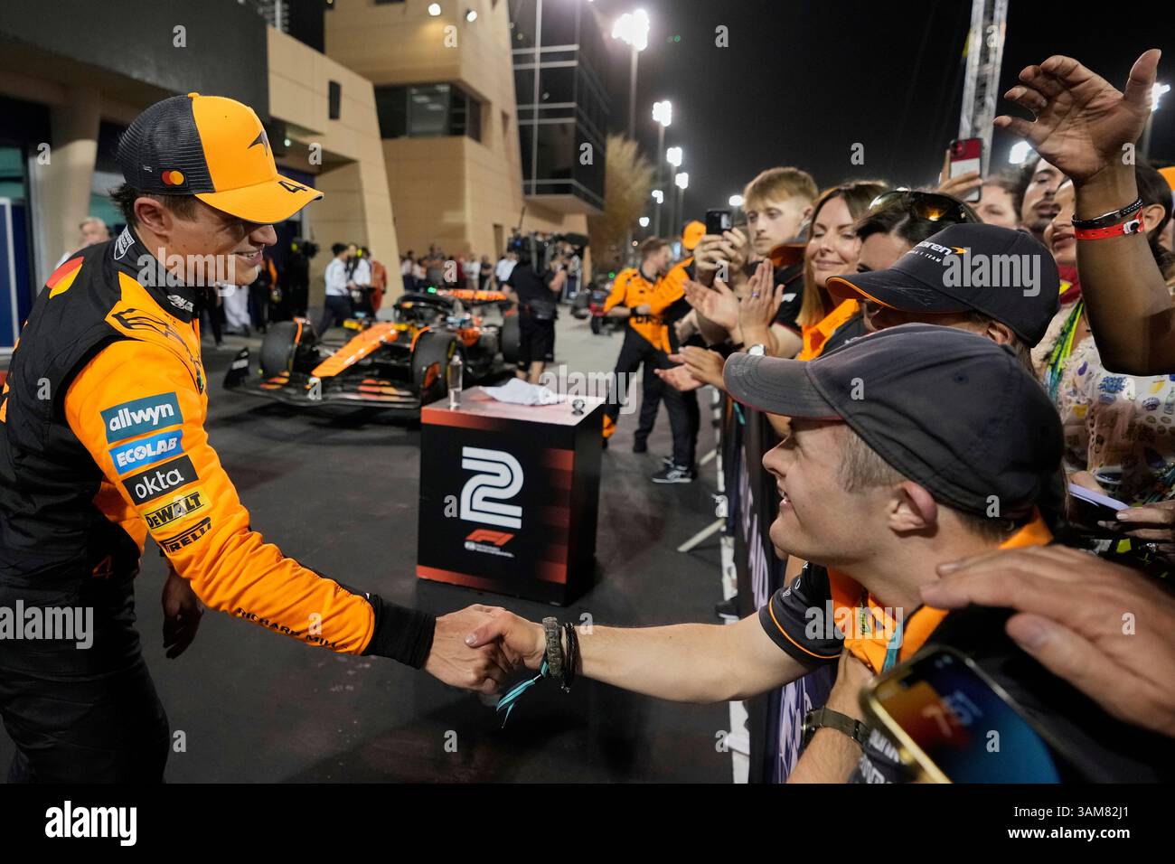 McLaren driver Lando Norris of Britain shakes hands after taking third ...