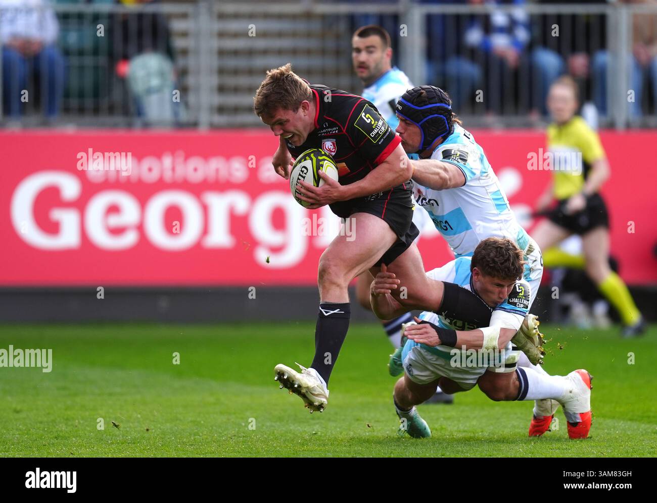 Gloucester's Jack Singleton on the way to scoring their side's second ...