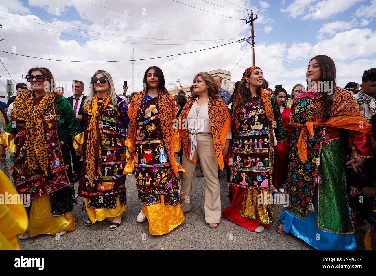 Al Hamdaniya, Iraq. 13th Apr, 2025. Iraqi Christians women wear ...