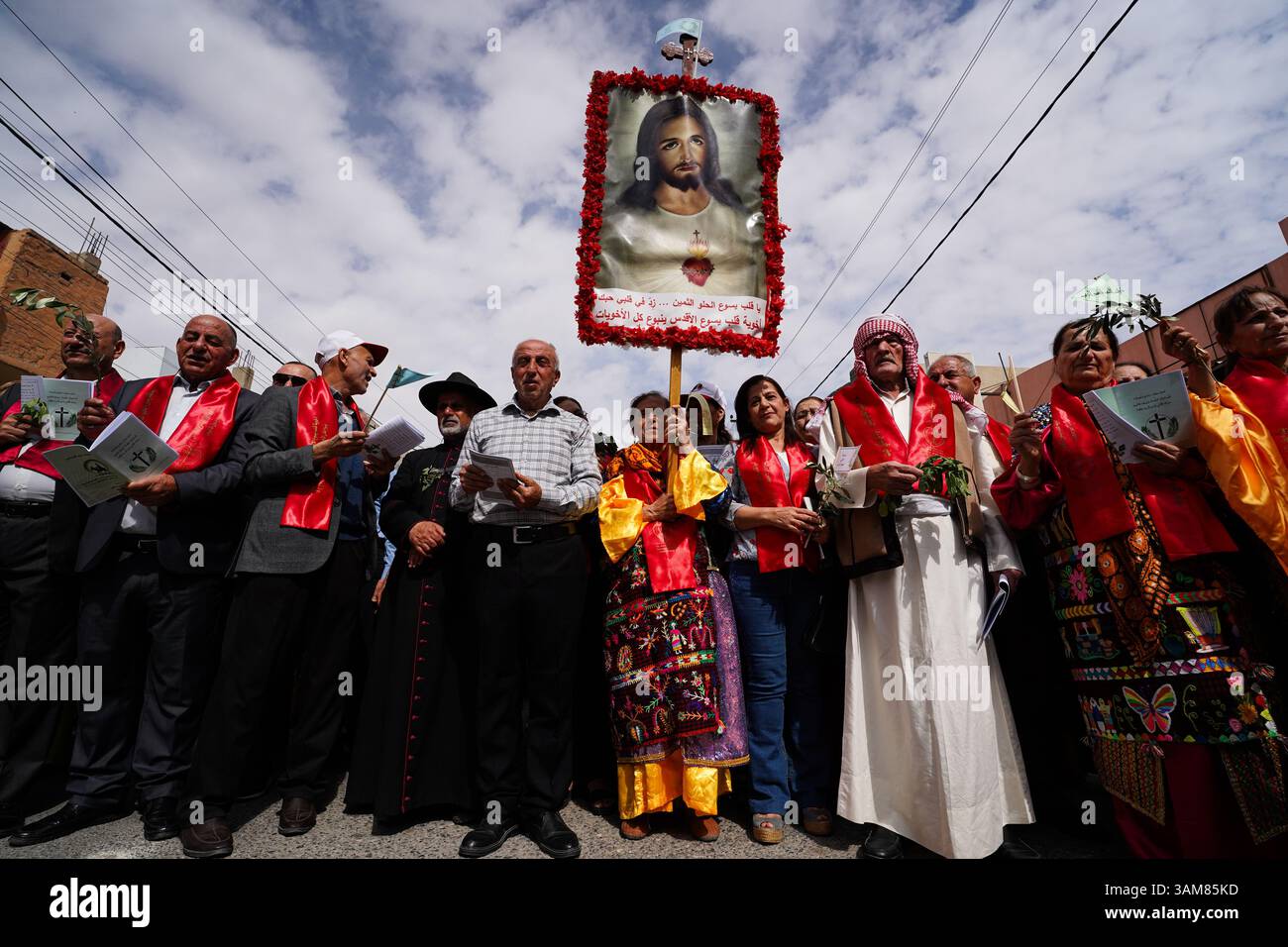 Al Hamdaniya, Iraq. 13th Apr, 2025. Iraqi Christians gather to ...