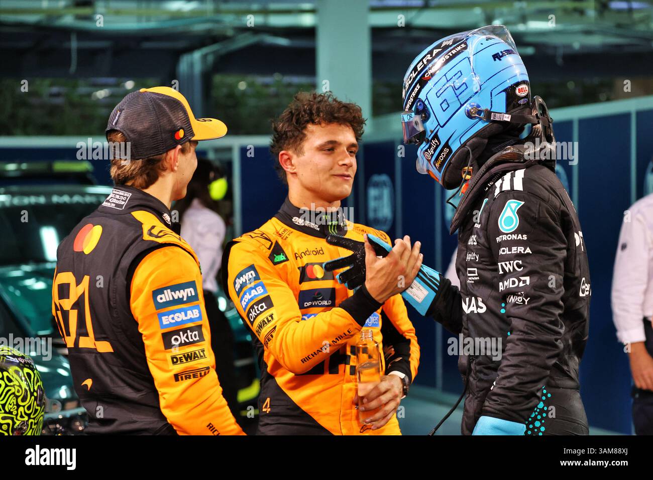 Sakhir, Bahrain. 13th Apr, 2025. (L to R): Race winner Oscar Piastri ...