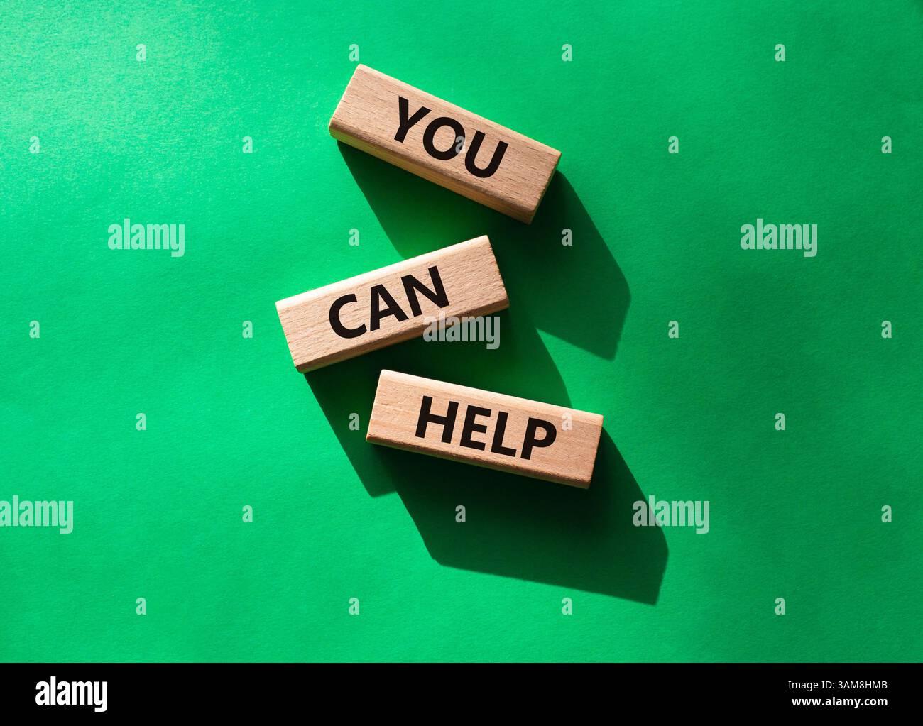You can help symbol. Wooden blocks with words You can help. Beautiful ...