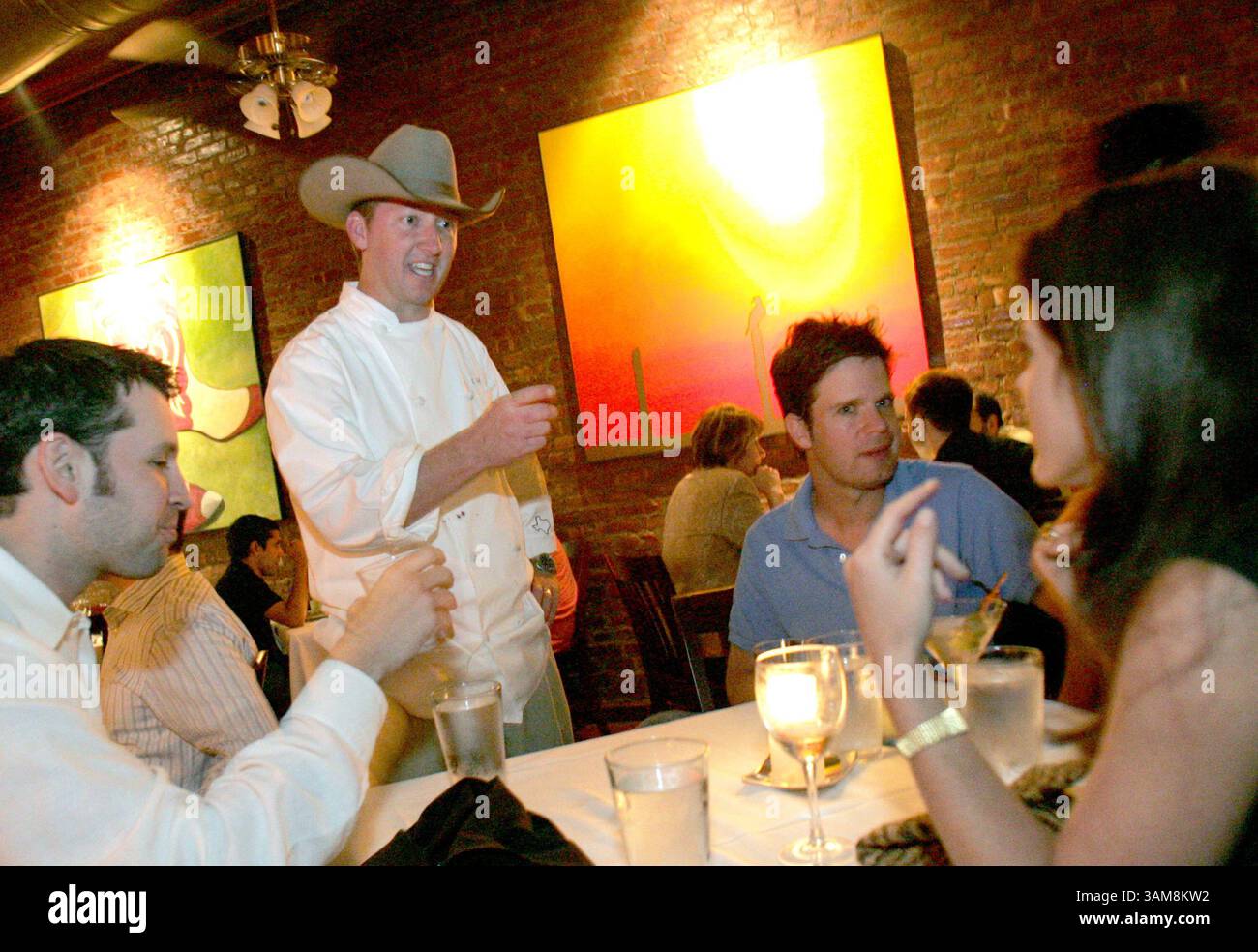 Sept. 16, 2006 - U.S. - Chef Tim Love, standing, gets comments from ...