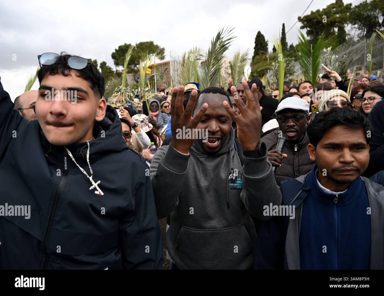 Christians dance and sing during the traditional Palm Sunday Procession ...