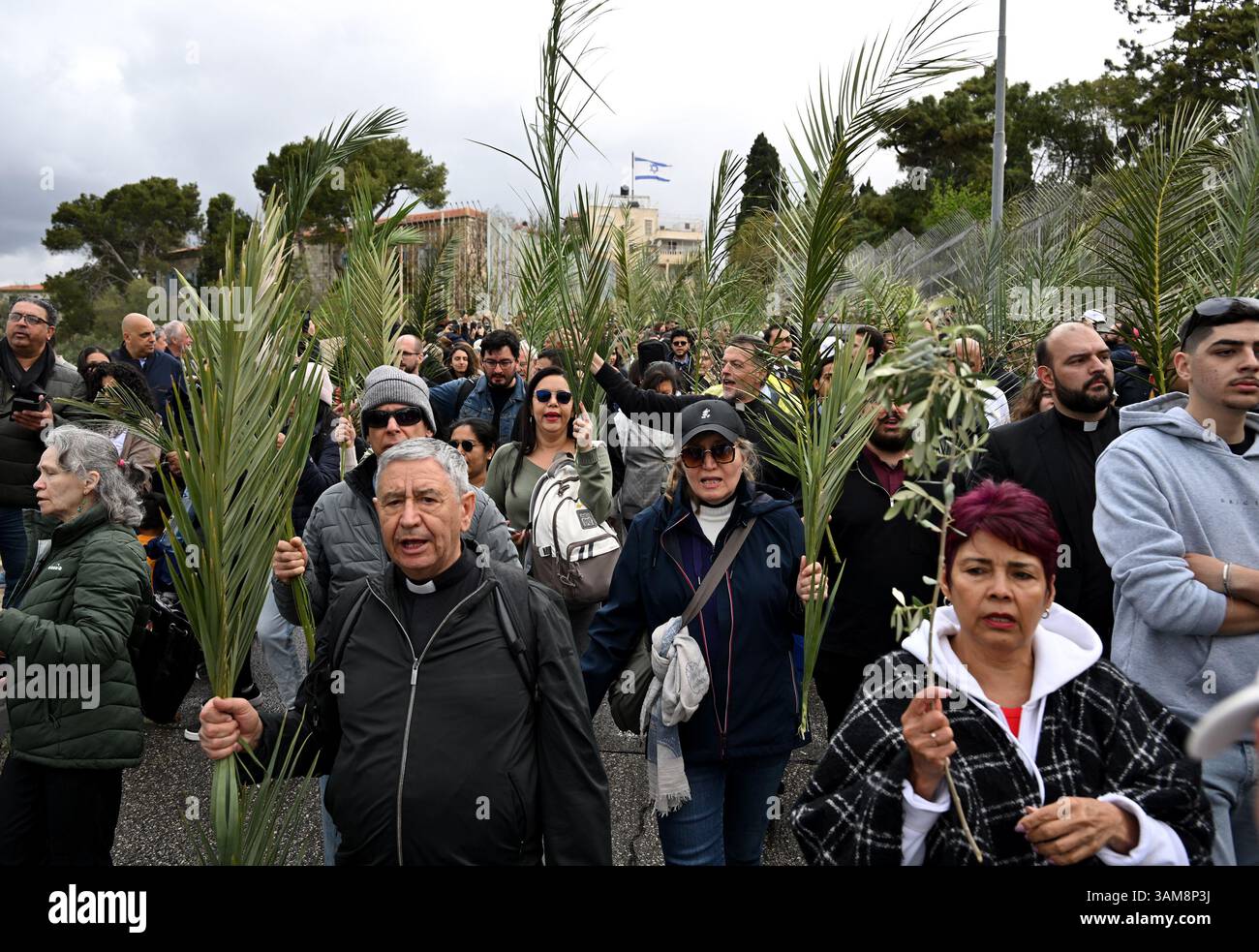 Jerusalem, Israel. 13th Apr, 2025. Thousands of Christians wave olive ...