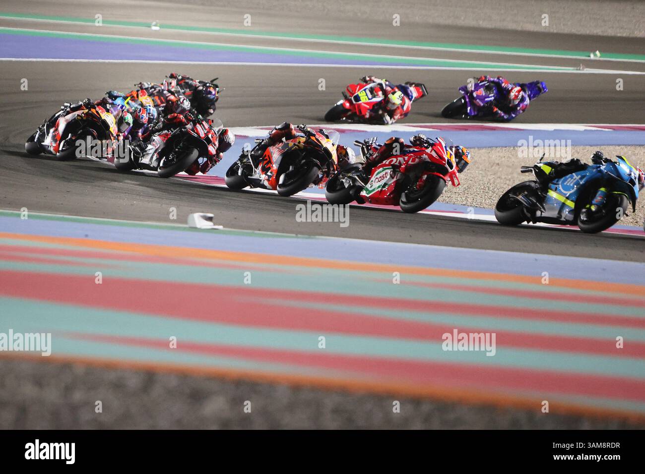 Riders compete during the MotoGP race of the Qatar Motorcycle Grand ...