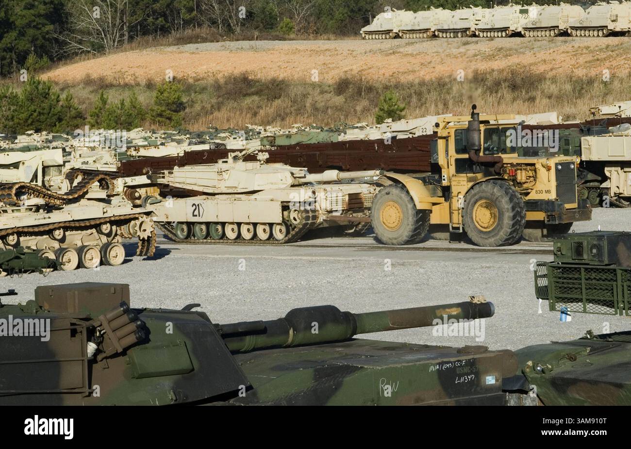 Dec. 4, 2006 - U.S. - A tractor pulls an M-1A1 tank from a storage yard ...