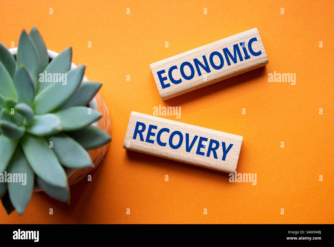 Economic recovery symbol. Concept words Economic recovery on wooden ...