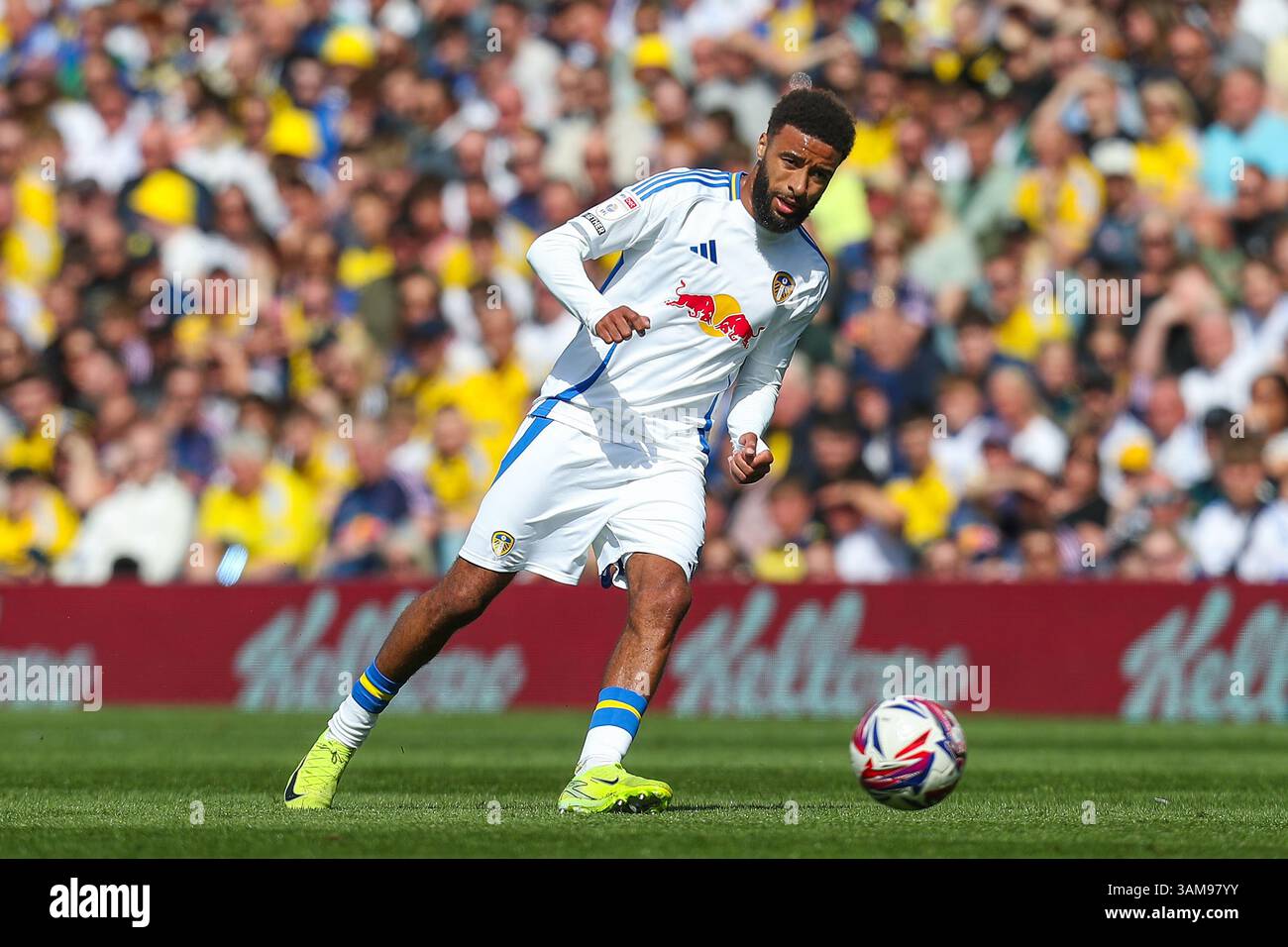 Leeds, UK. 12th Apr, 2025. Jayden Bogle of Leeds United passes the ball ...