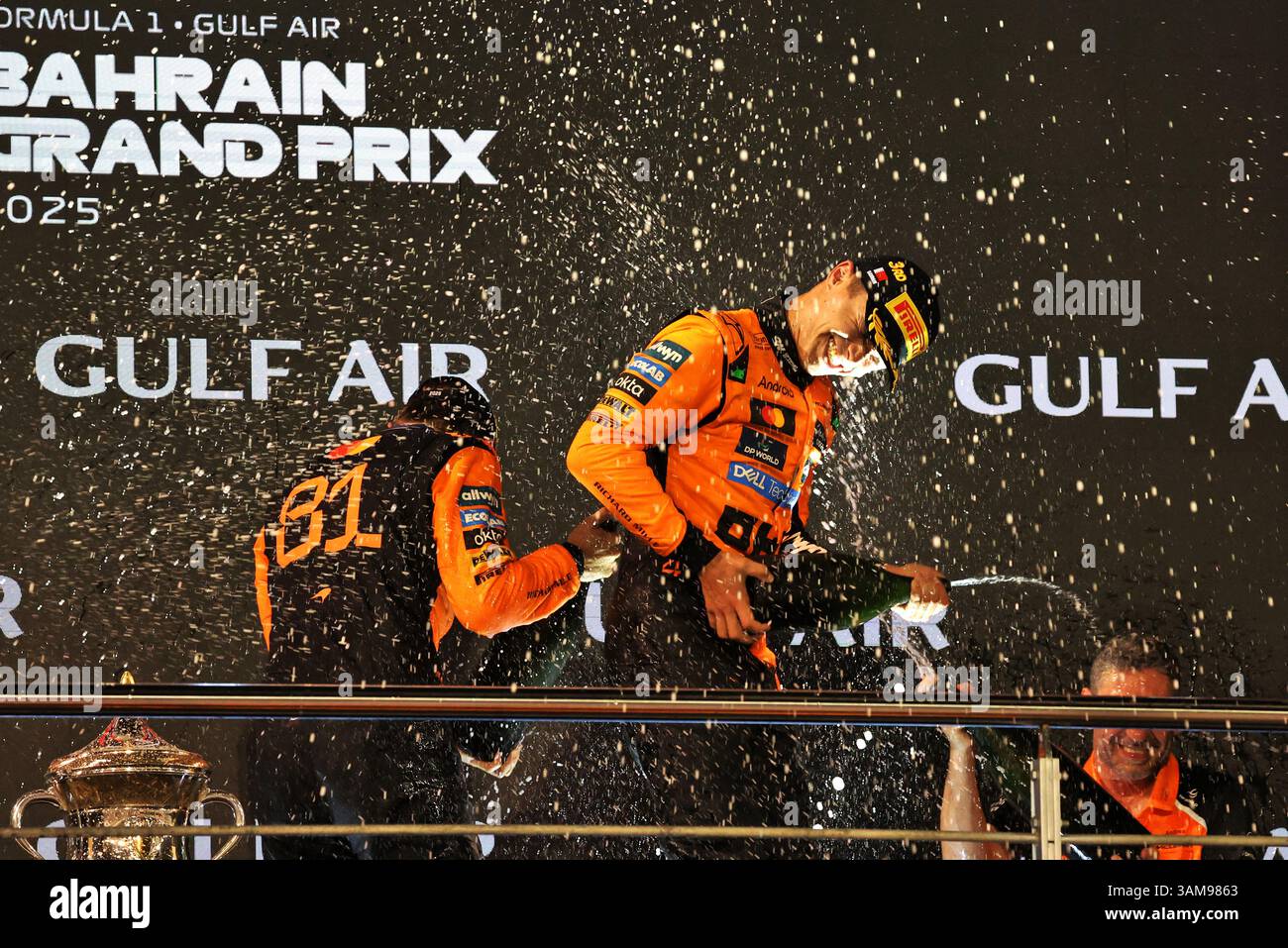 Lando Norris (GBR) McLaren celebrates his third position on the podium ...