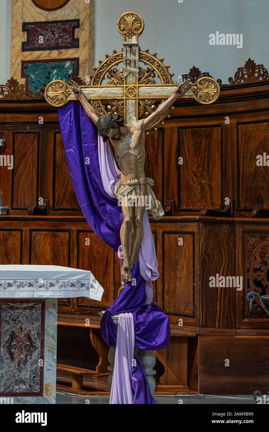 Parish Church of San Benedetto Martire,crucifix covered by the purple ...