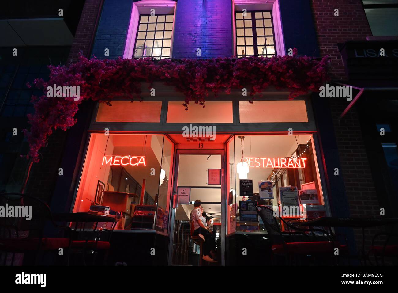 Outside the Mecca Restaurant in downtown Raleigh, NC, where little has ...