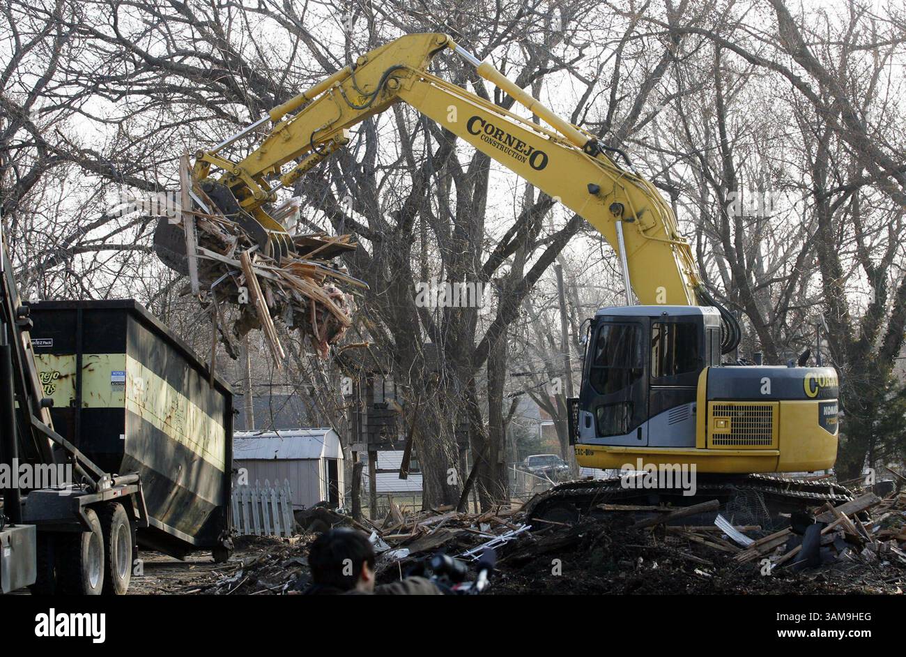 March 7, 2007 - U.S. - A crew from Cornejo and Sons raze the home that ...