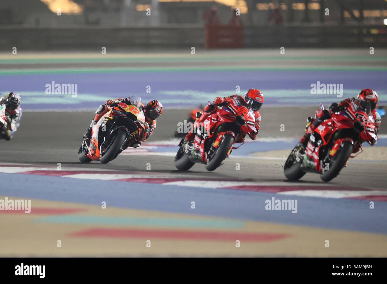 From left: Spain's Maverick Vinales of Red Bull KTM Tech3, Spain's Alex Marquez of BK8 Gresini ...