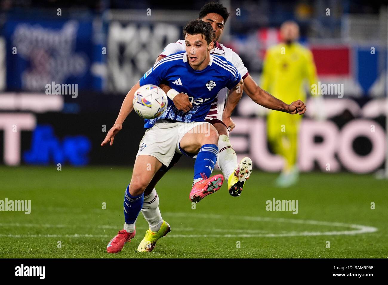 Torino's Saul Coco fights for the ball with Como's Anastasios Douvikas ...