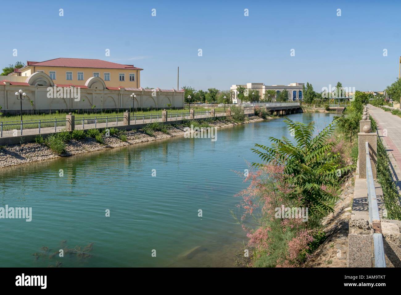 The blue pond in the downtown of Urgench city, Uzbekistan, with the ...