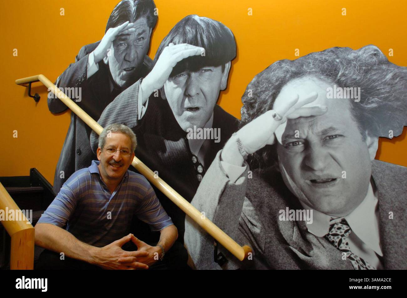 May 29, 2007 - U.S. - Gary Lassin sits on the staircase with three ...