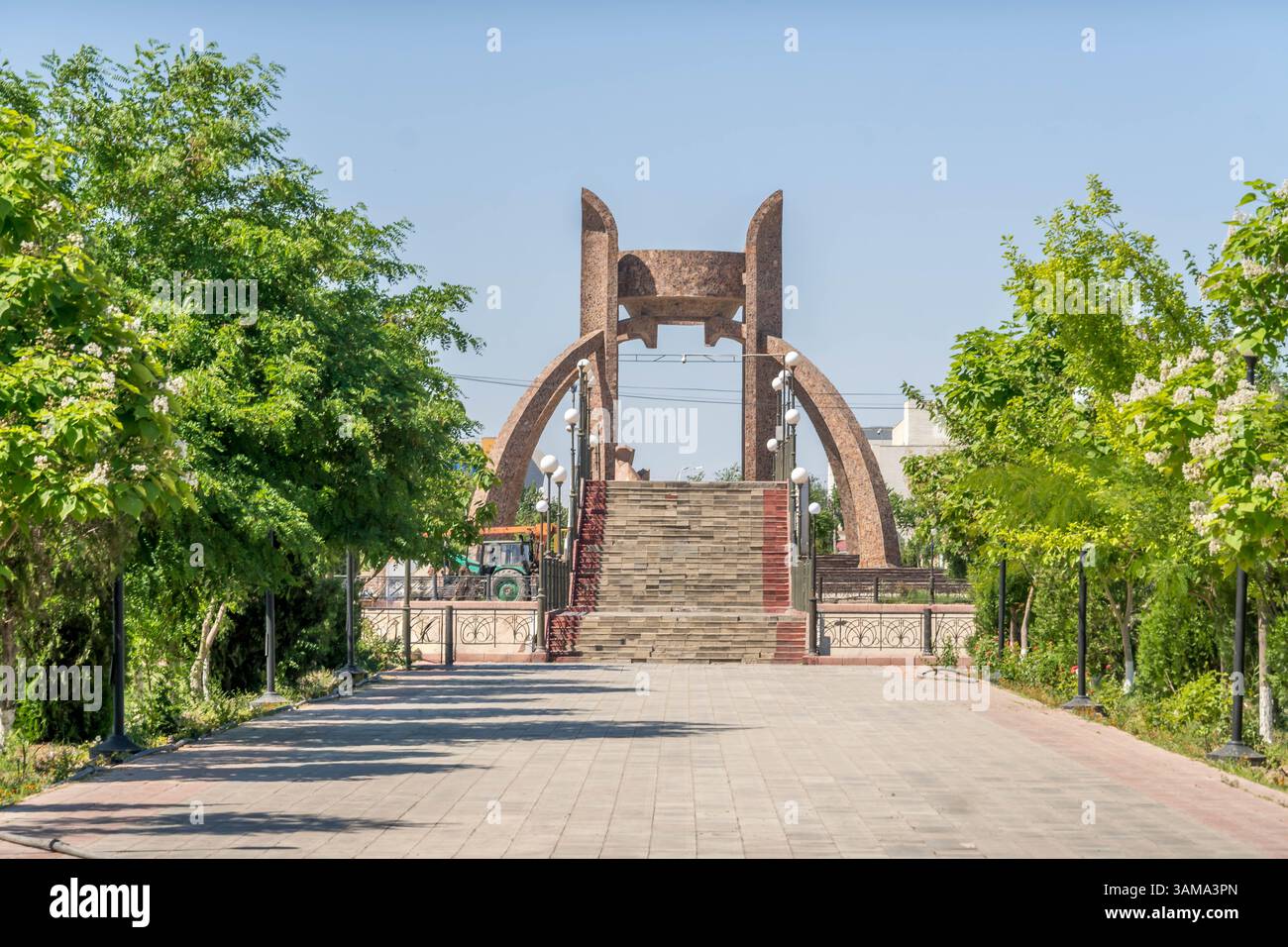 Avesto monument in Urgench city, Uzbekistan, with the park around and ...
