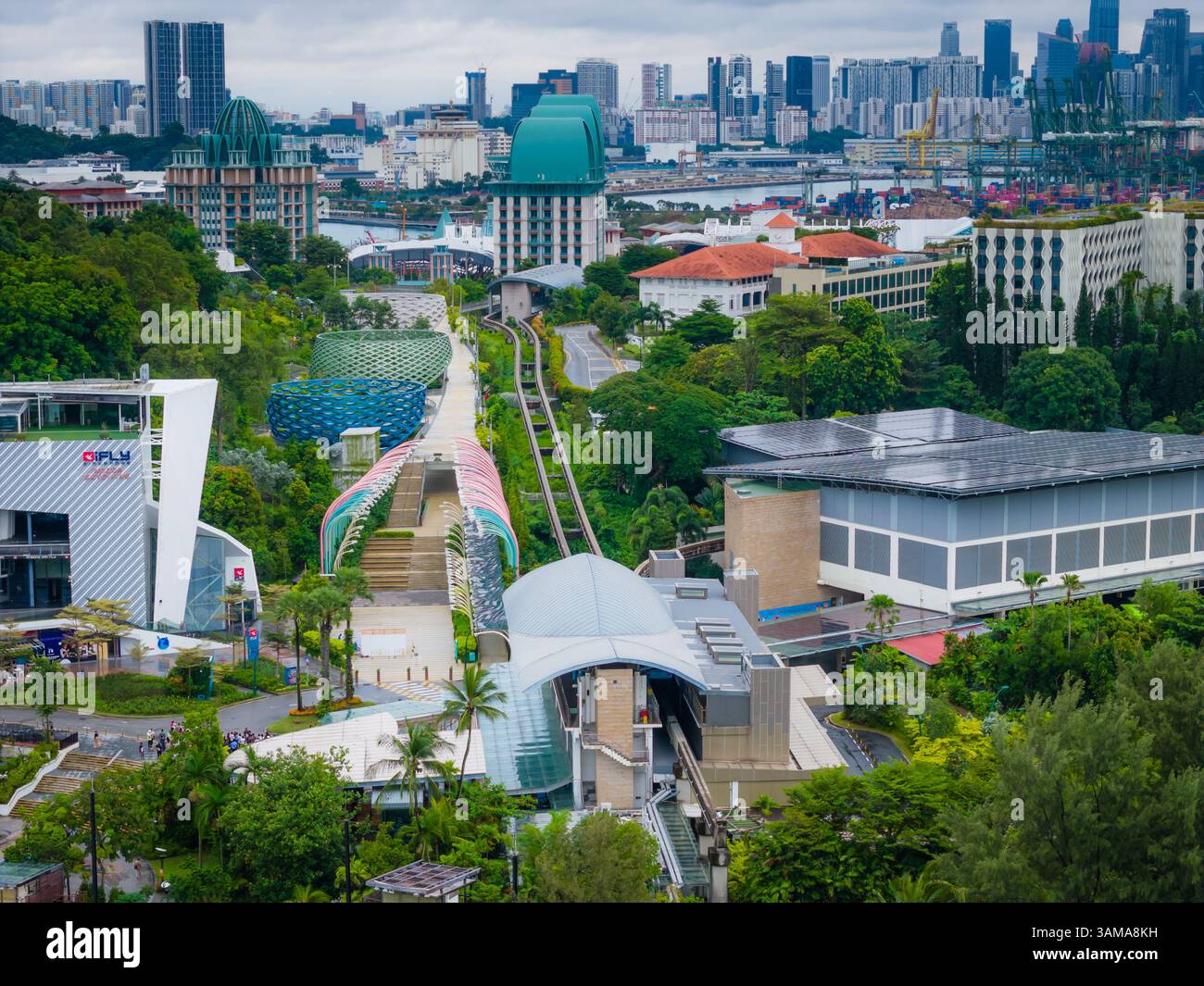03 12 2025 - Singapore. Sentosa island and Sentosa Express moving tram ...