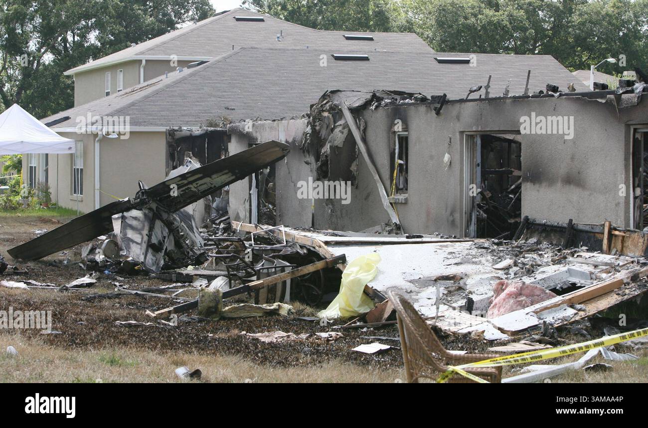 July 11, 2007 - U.S. - Burned airplane parts and debris lay scattered ...