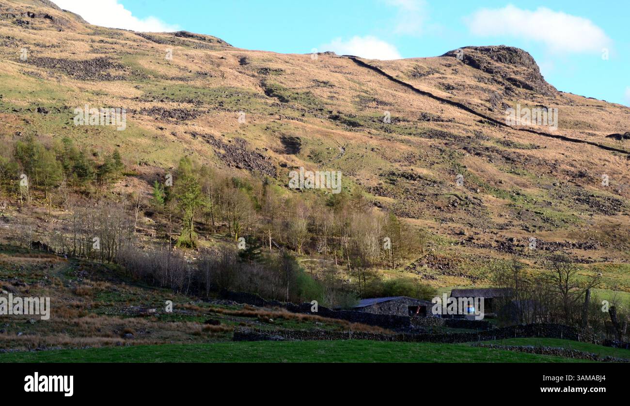 Cockley Beck, Cumbria, UK, 13th April, 2025. Sunshine on the fells with ...