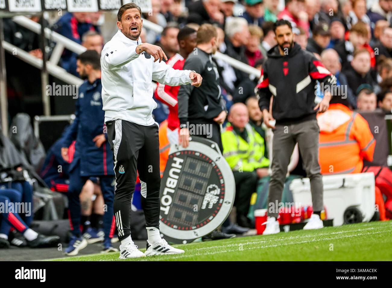 Jason Tindell, assistant coach of Newcastle United gives the team ...