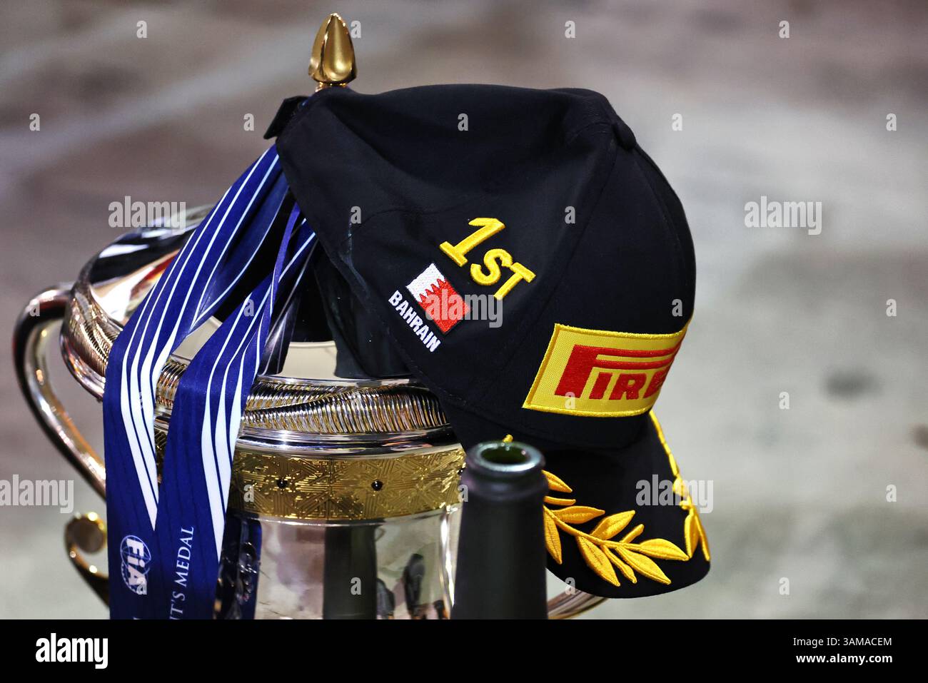 Sakhir, Bahrain. 13th Apr, 2025. The cap, medal, and trophy of race ...