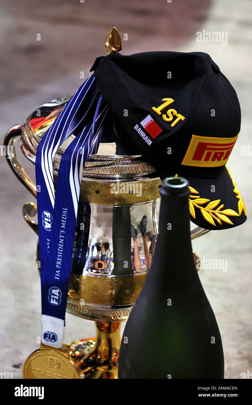 Sakhir, Bahrain. 13th Apr, 2025. The cap, medal, and trophy of race ...