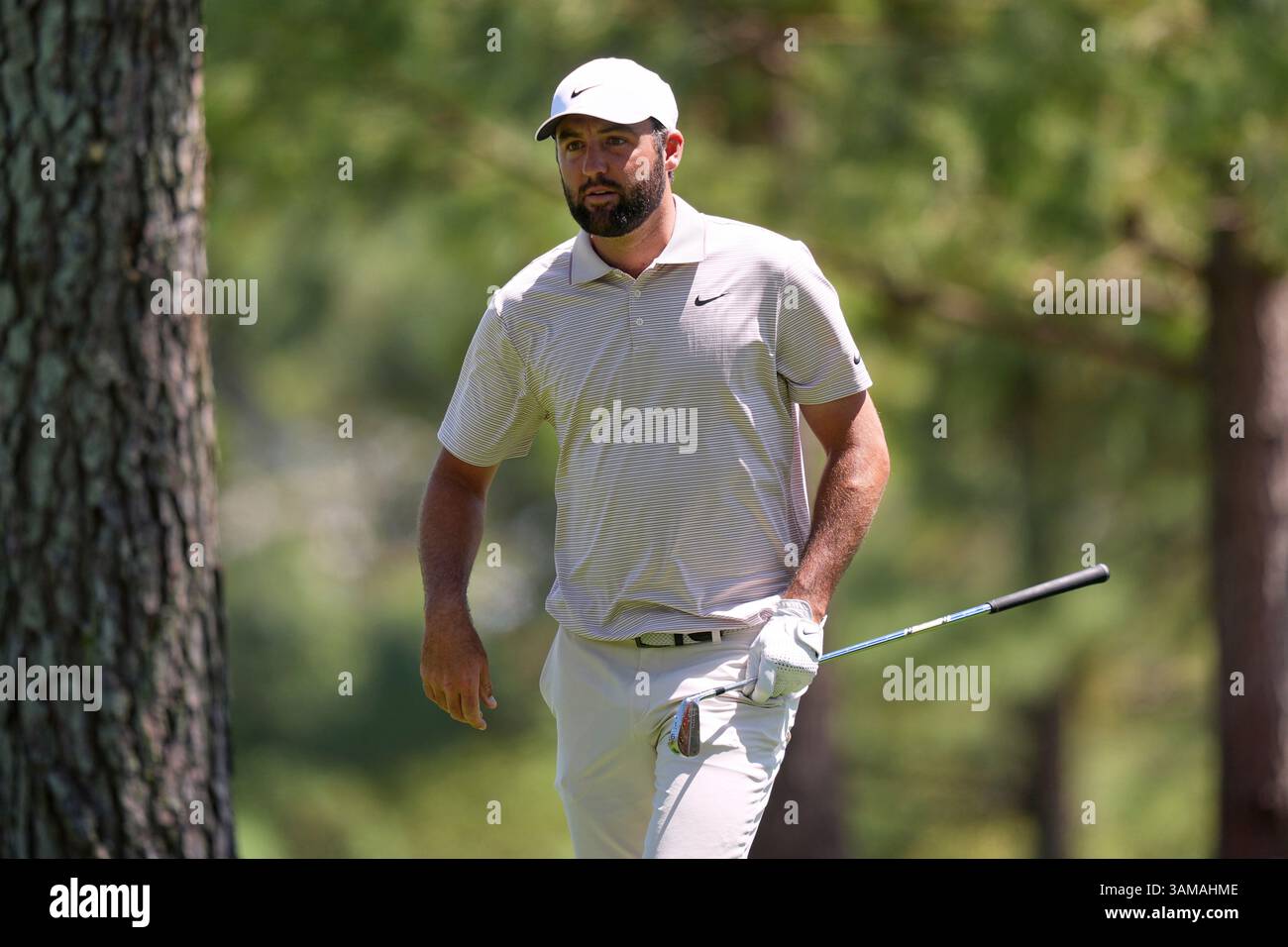 Scottie Scheffler walks to the green on the first hole during the final ...
