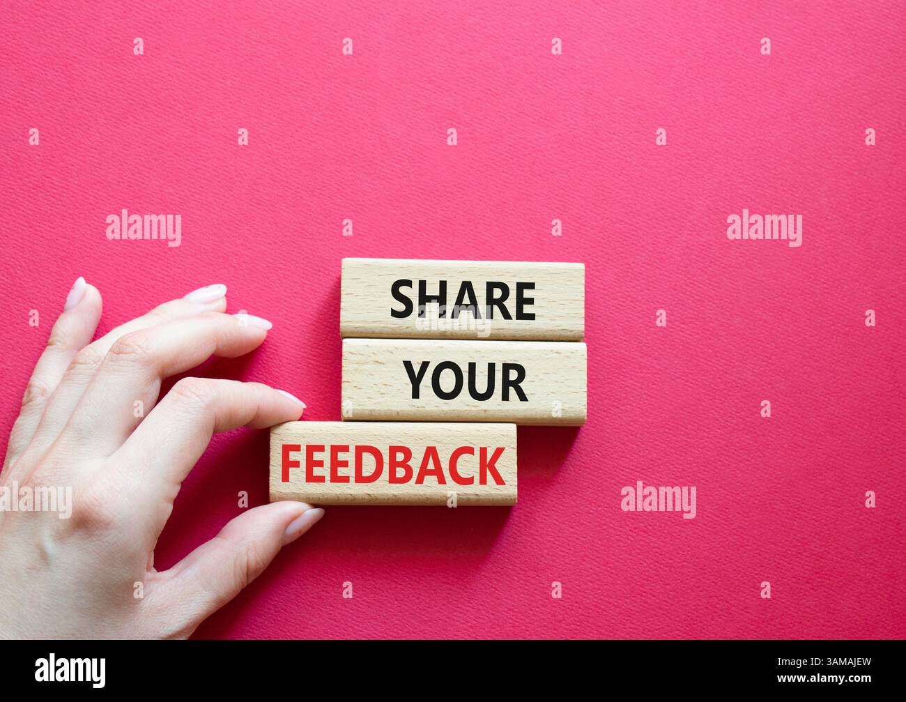 Feedback symbol. Concept word Give your feedback on wooden blocks ...