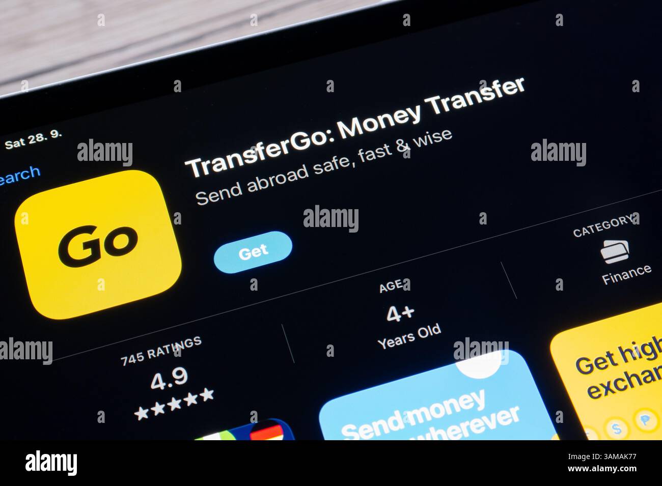 OSTRAVA, CZECHIA - SEPTEMBER 28, 2025: Apple app store with TransferGo ...