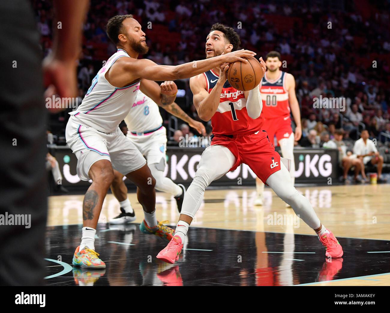 Washington Wizards guard Colby Jones (1) is fouled by Miami Heat ...