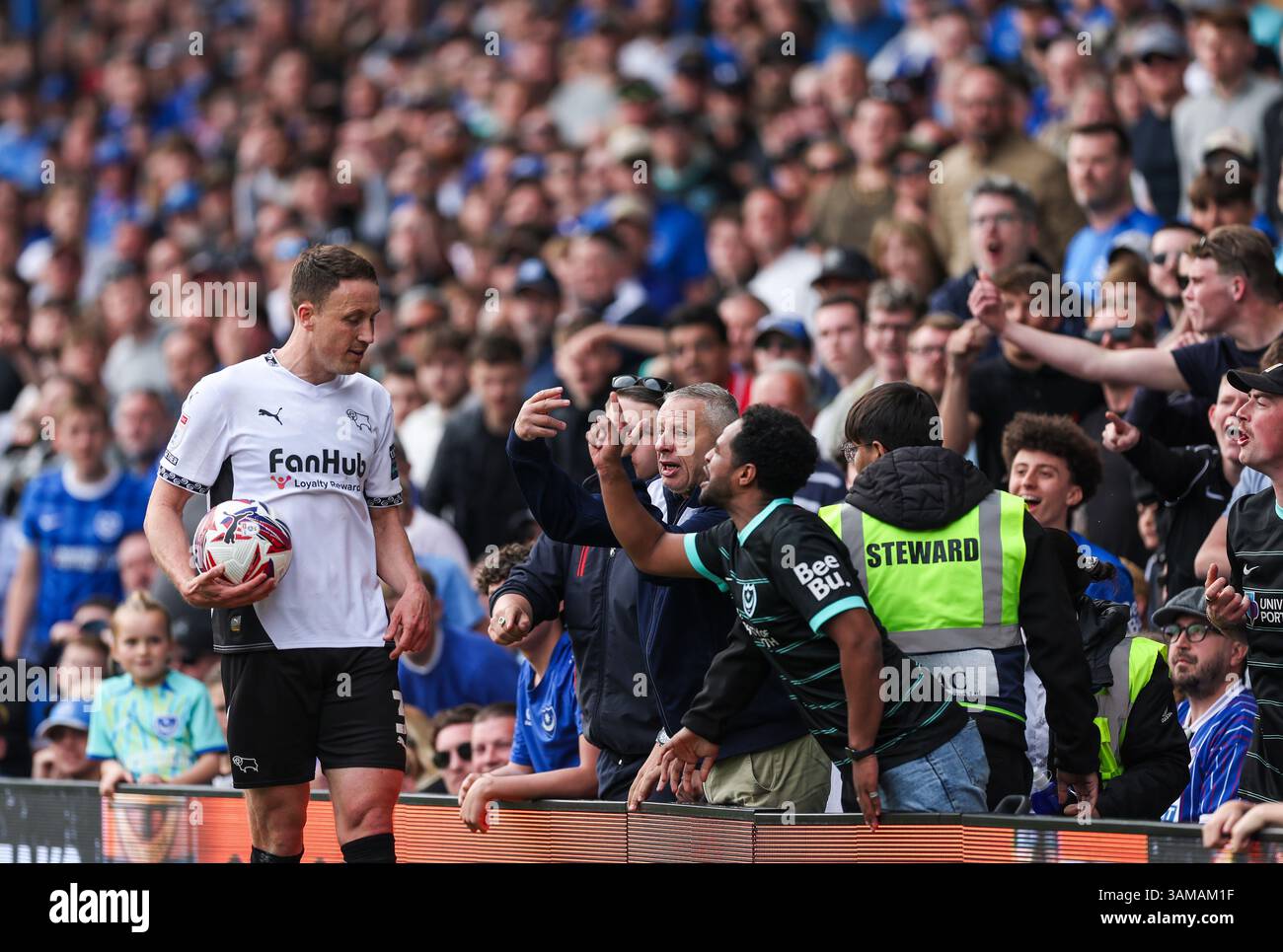 Portsmouth fans having words with Derby County's Craig Forsyth during ...