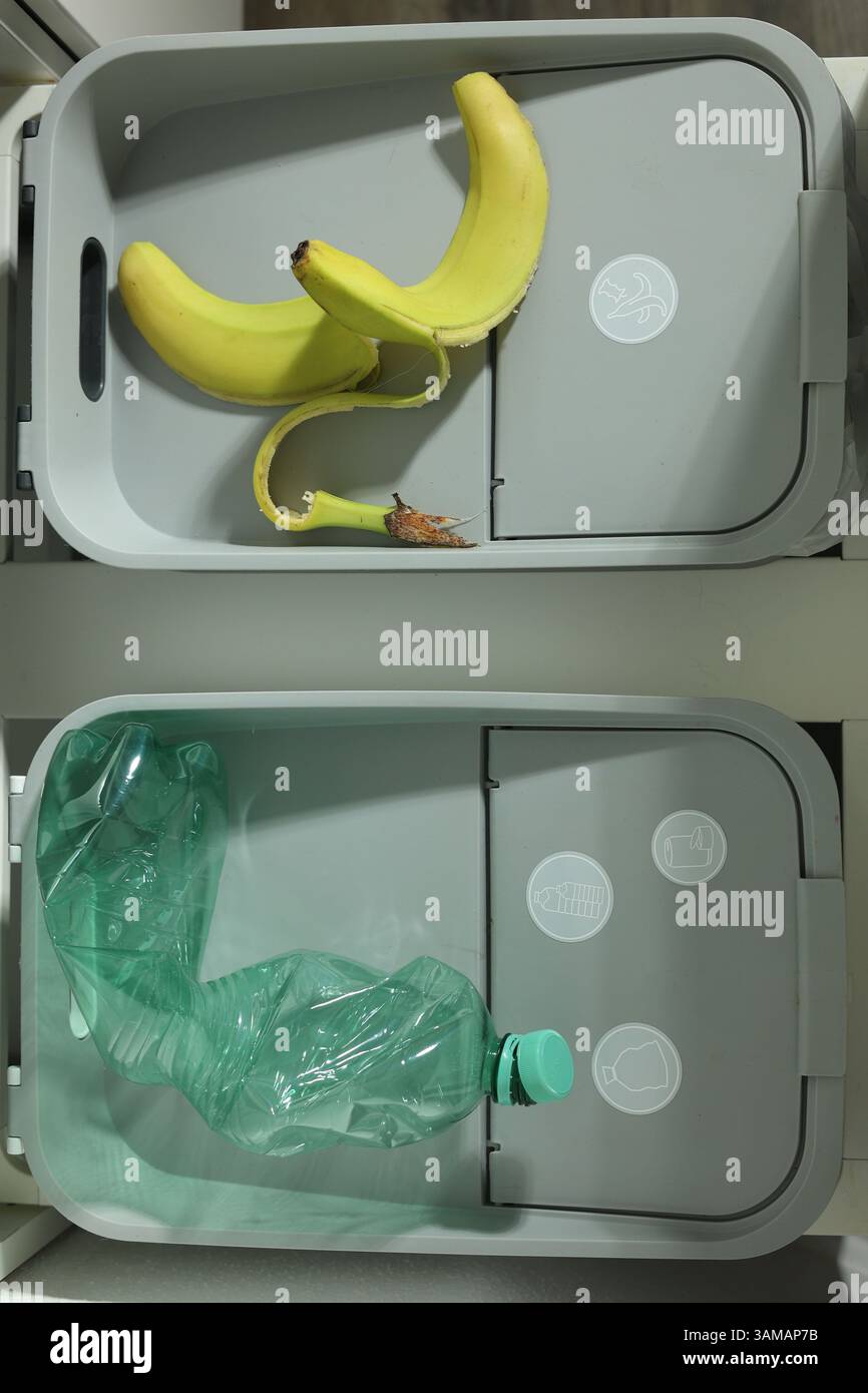 waste separation, two different containers for plastic and bio waste ...