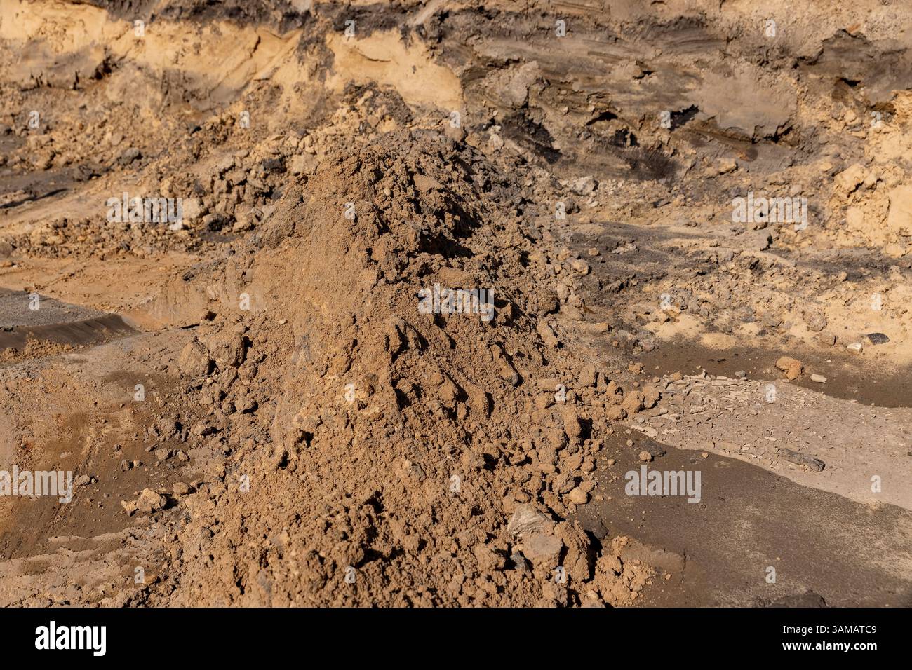 a pit for laying different layers of materials before asphalting a road ...