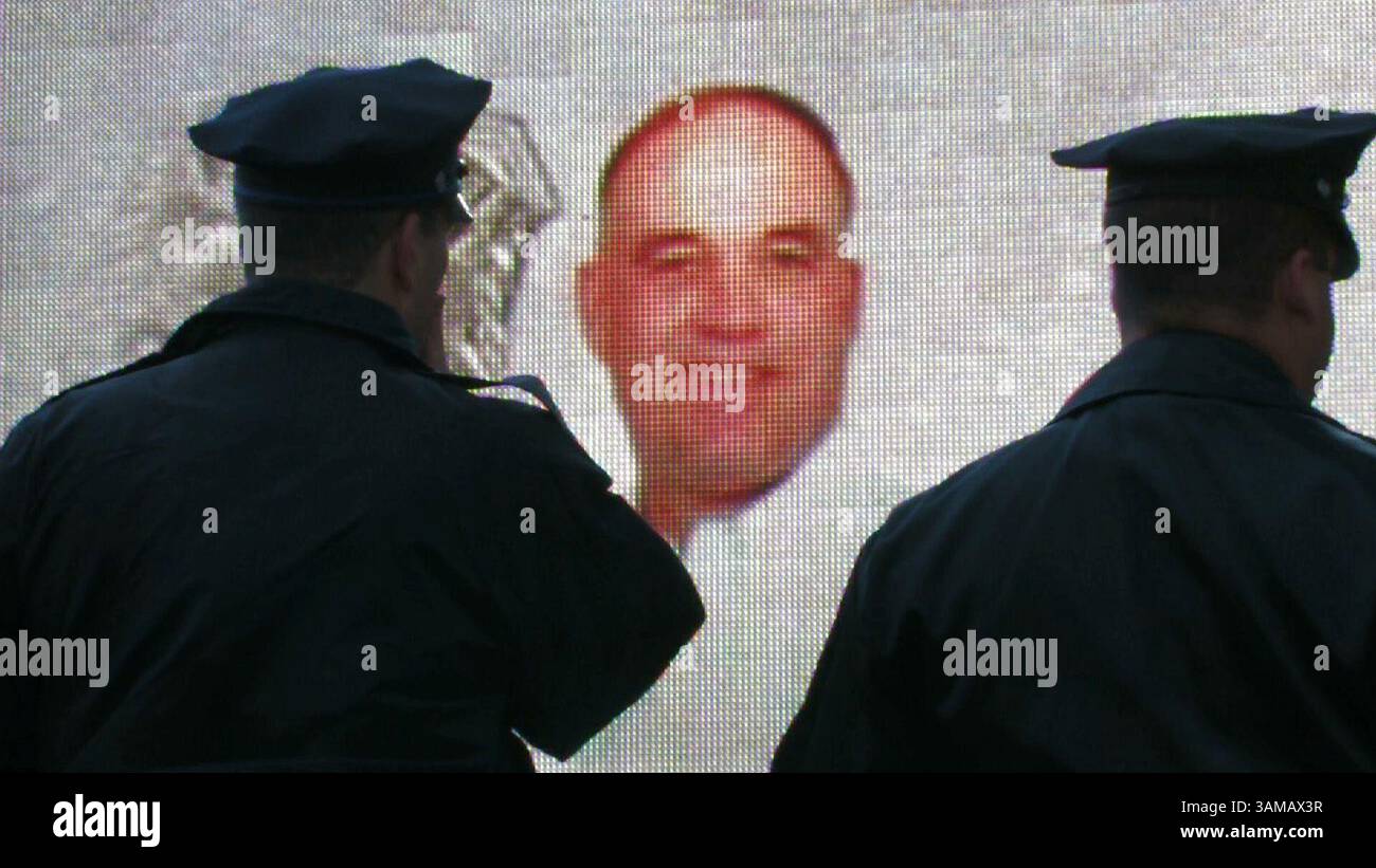 Nov. 7, 2007 - Philadelphia Police officer watch a large screen TV with ...