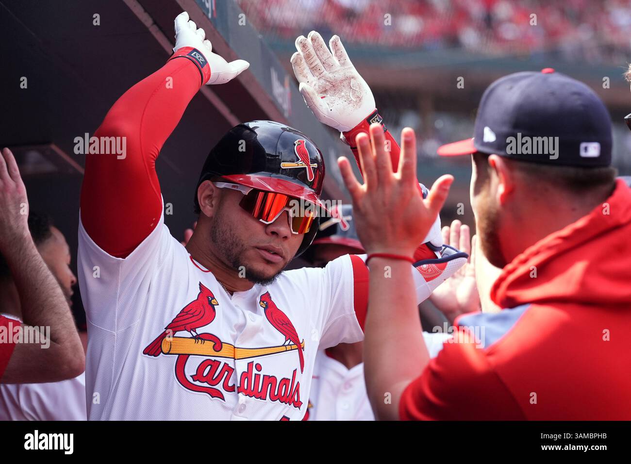 St. Louis Cardinals' Willson Contreras, left, is congratulated by ...