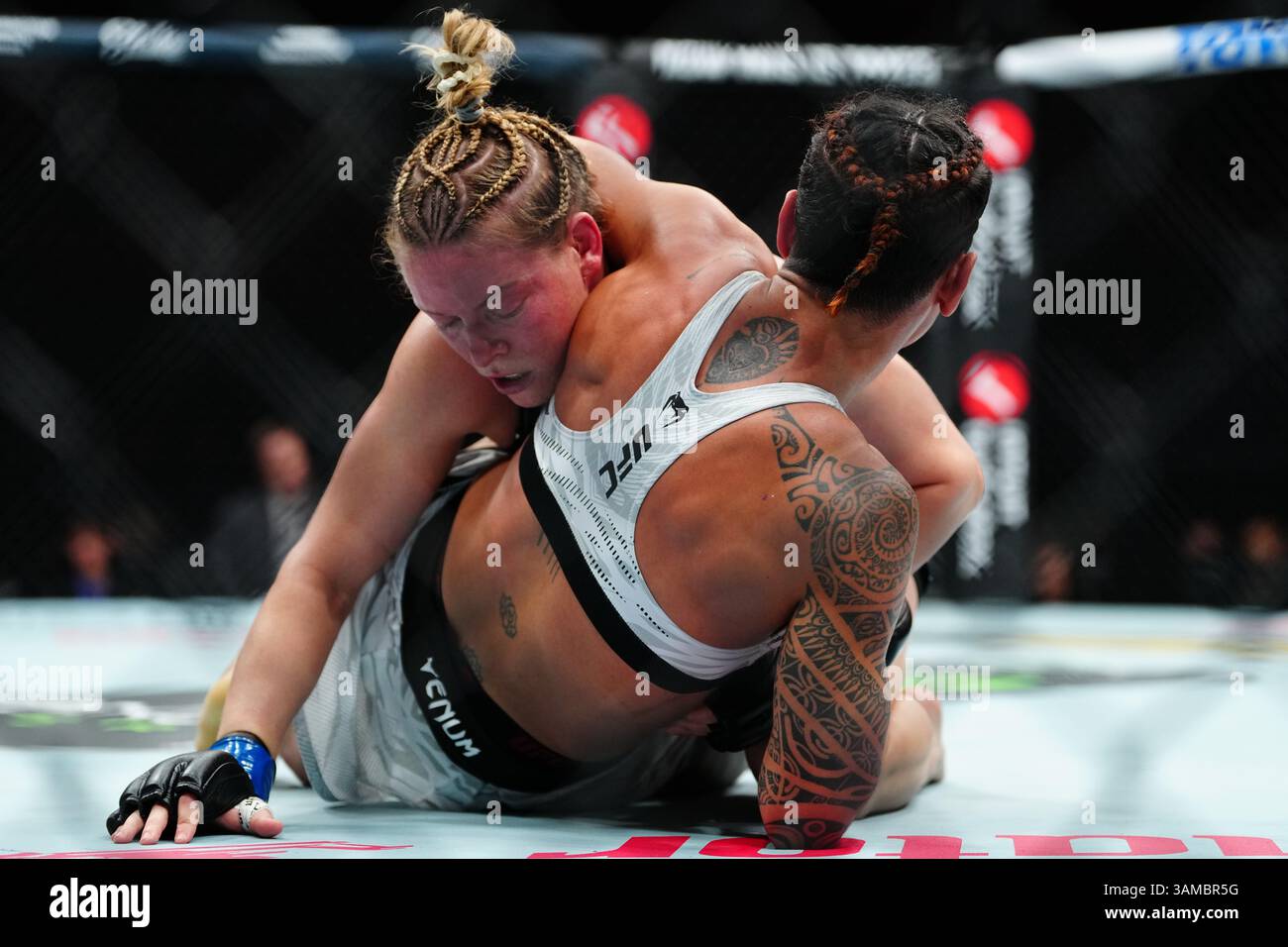 MIAMI, FL - APRIL 12:Nora Cornolle and Hailey Cowan meet in the octagon ...