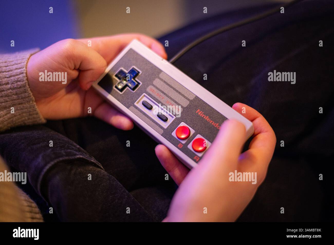 Retro Gaming Joystick Nintendo in hands Stock Photo - Alamy