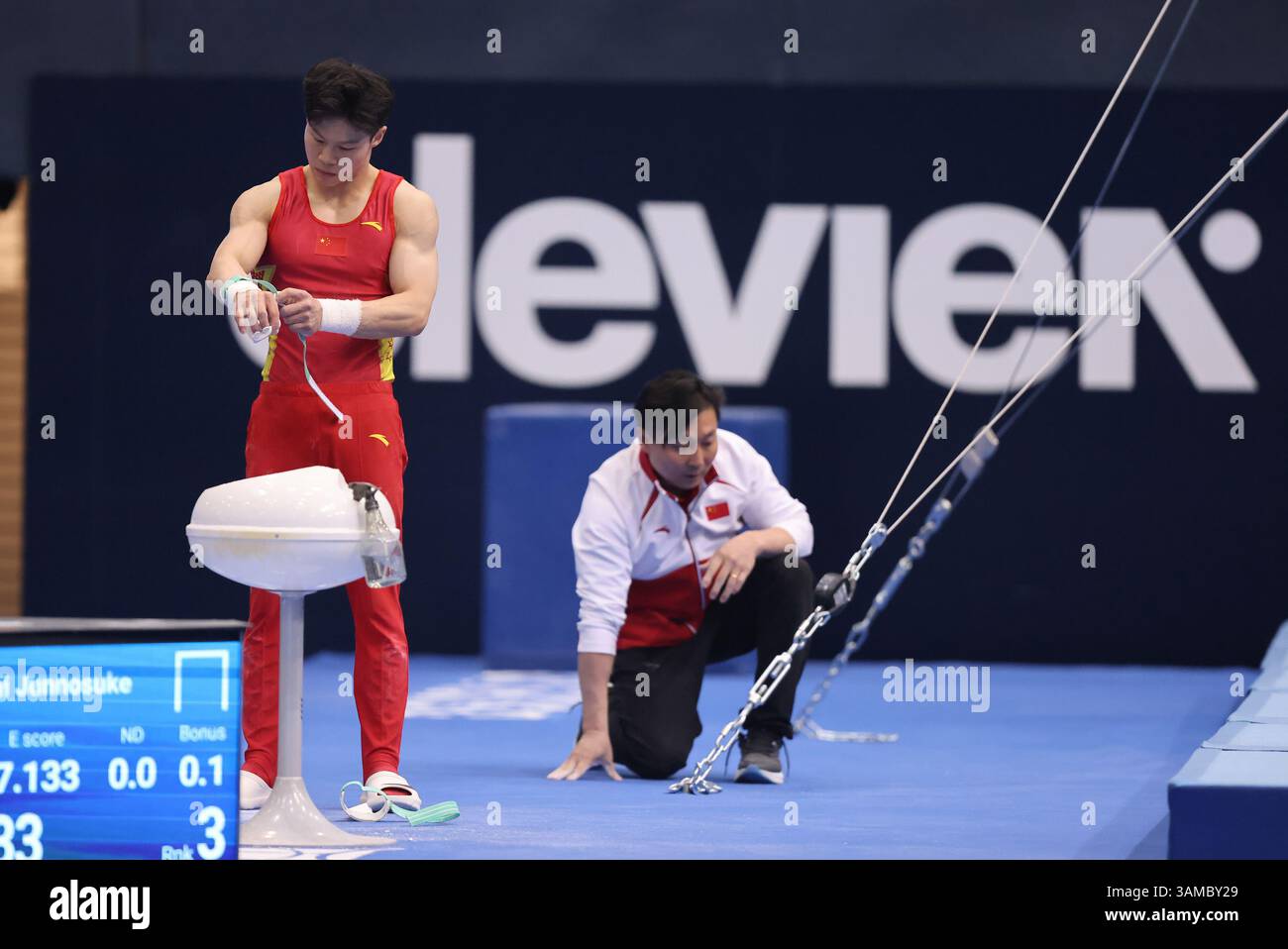 OSIJEK, CROATIA - APRIL 13: Xia Chenyl of China performs on horizontal ...