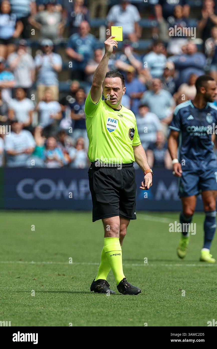 Kansas City, KS, USA. 13th Apr, 2025. The referee issues a yellow card ...
