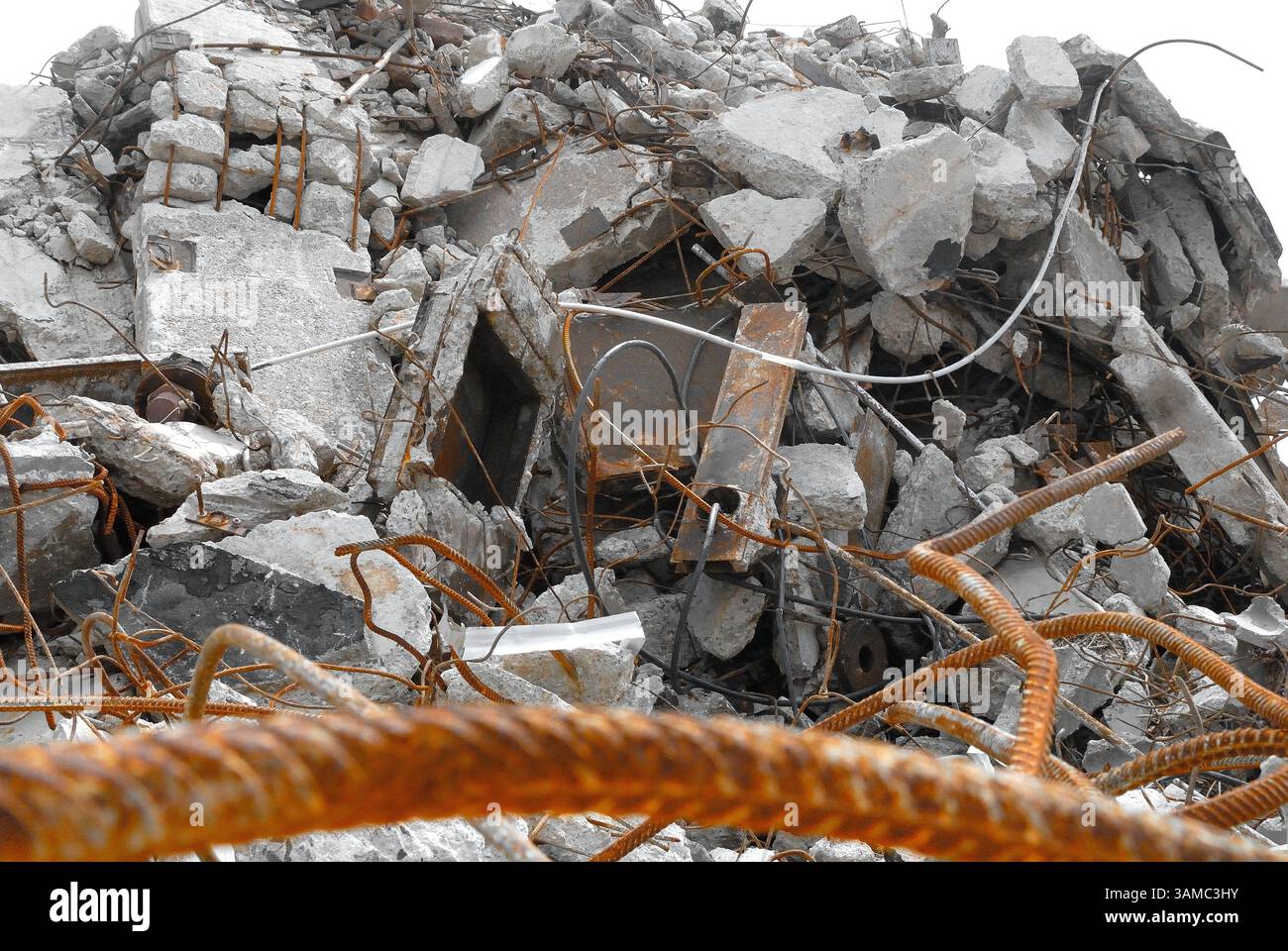 Pile of rubble with iron rods Stock Photo - Alamy