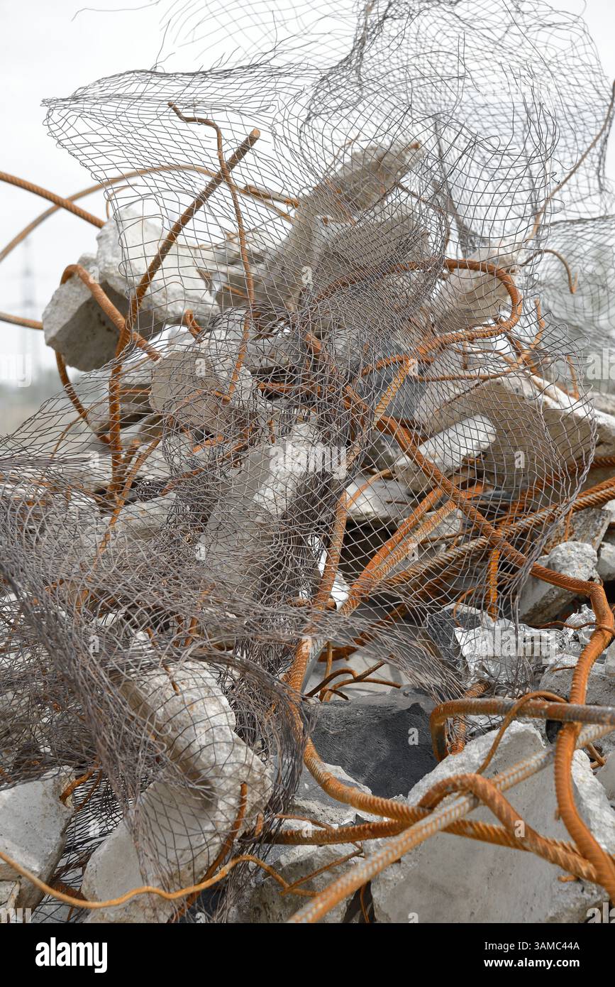 Pile of rubble with iron rods Stock Photo - Alamy